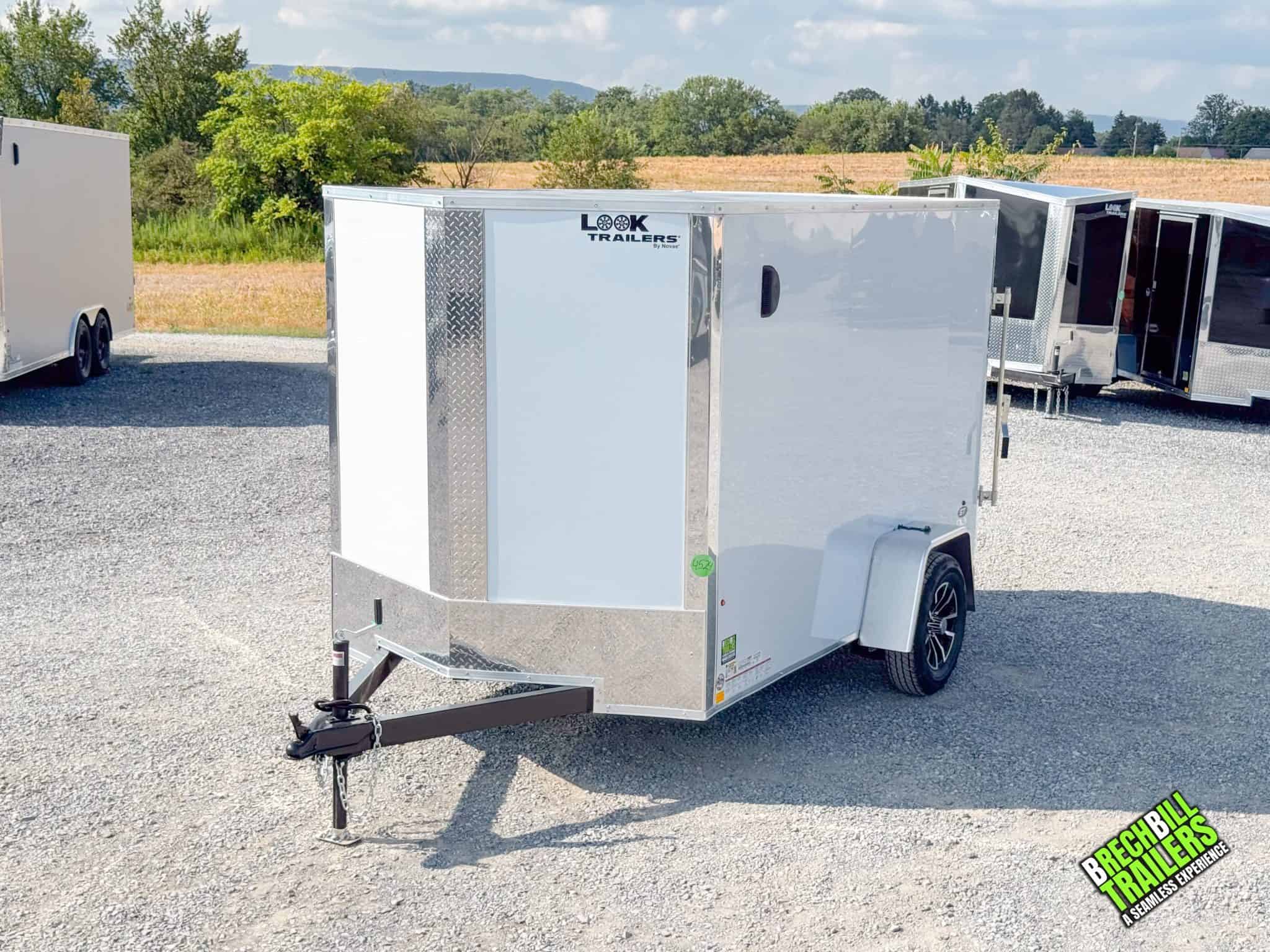 6x10 White V-Nose Trailer W/ Composite Sides & Black Alloys